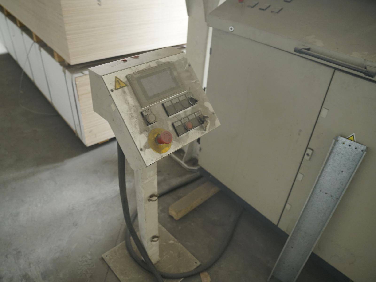 Stacking and destacking device Stacking and destacking device TOMASSINI ...