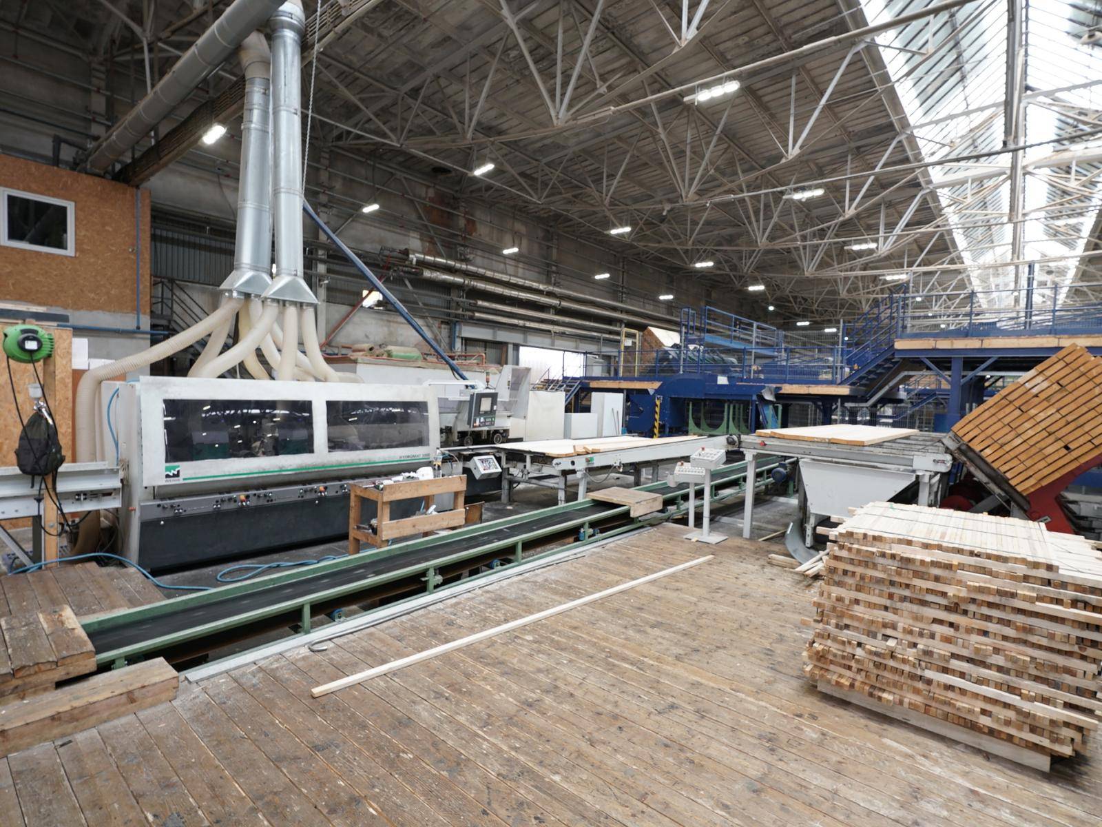 WEINIG Planing line with automatic infeed and automatic destacking ...