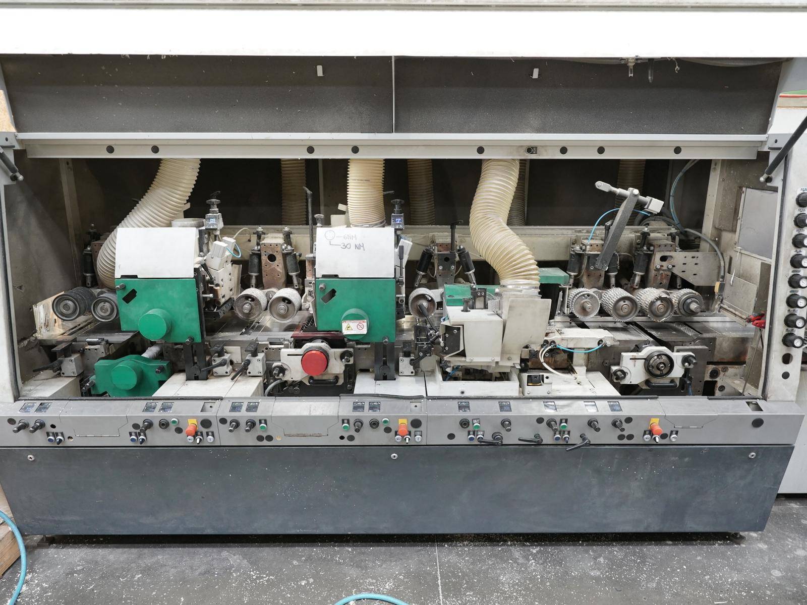 WEINIG Planing line with automatic infeed and automatic destacking ...