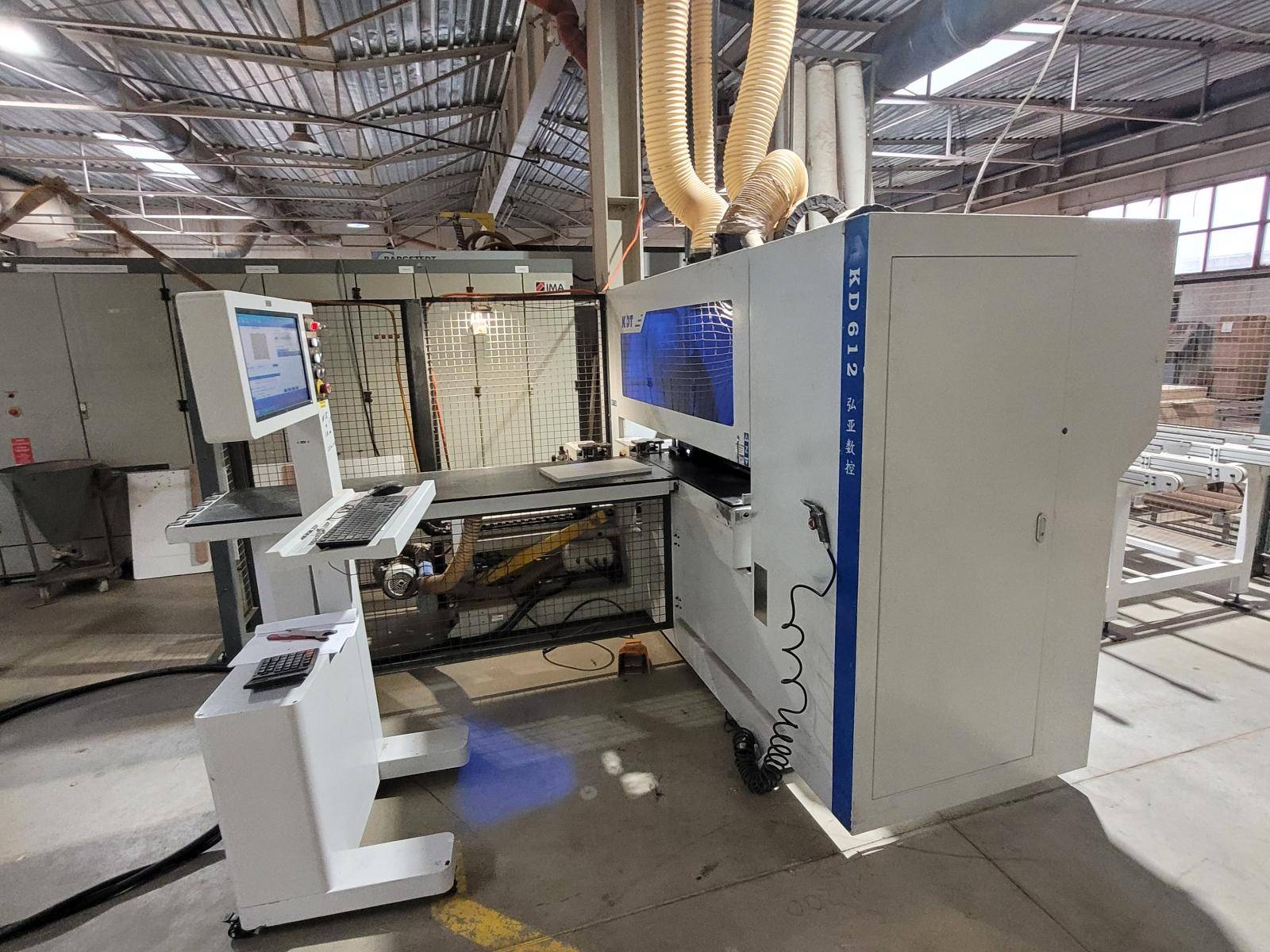 KDT Horizontal through-feed CNC with clamps KD 612 KHS buy second-hand