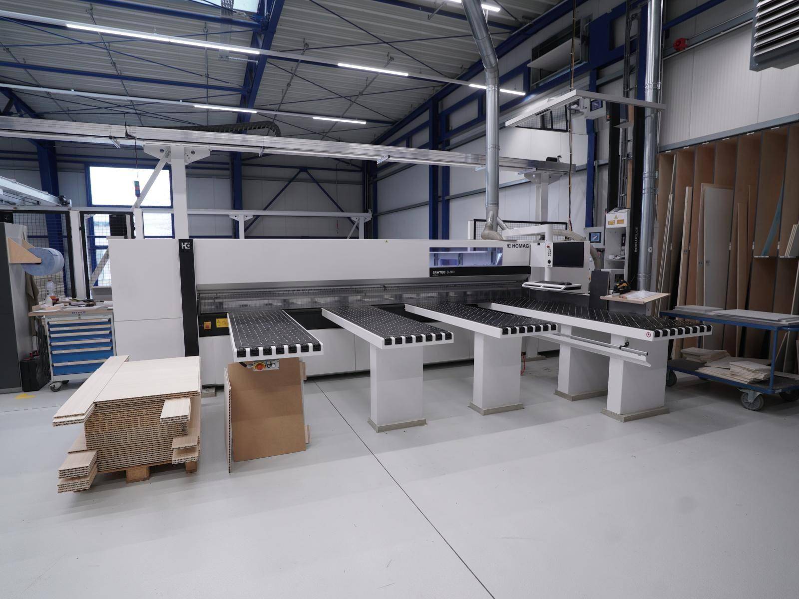 HOMAG Panel sizing cell with automatic storage, nesting CNC and panel ...