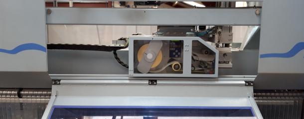 HOMAG Label printer integrated in the pressure beam - WOOD TEC PEDIA
